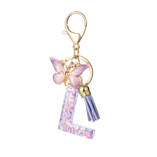 Colgante de resina con la letra L y borla de mariposa morada on OnBuy